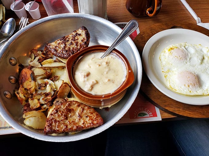 Biscuits swimming in country gravy alongside sunny-side eggs—a breakfast that says "good morning" with a hearty Pennsylvania accent.