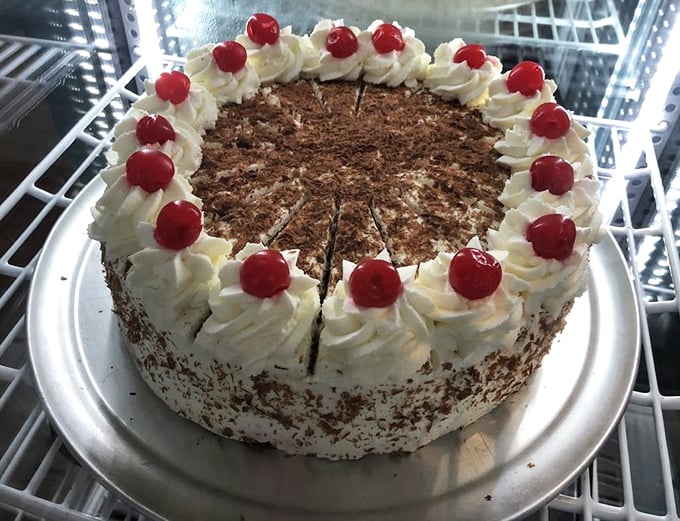 Black Forest cake that would make your German grandmother weep with joy—chocolate, cream, and cherries in perfect harmony.