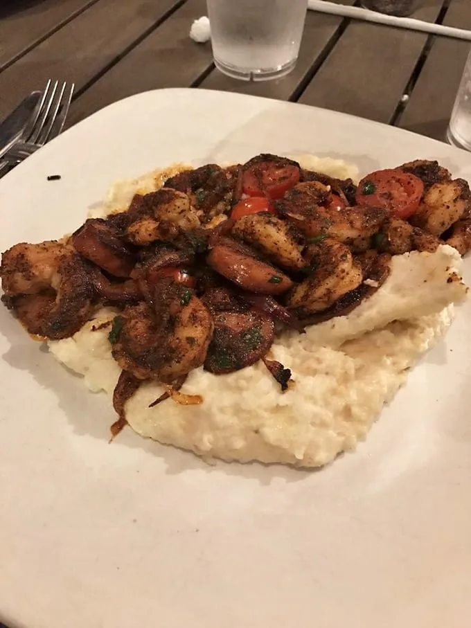 These blackened shrimp aren't just resting on those grits—they're having a flavor party and inviting your taste buds to join the celebration.