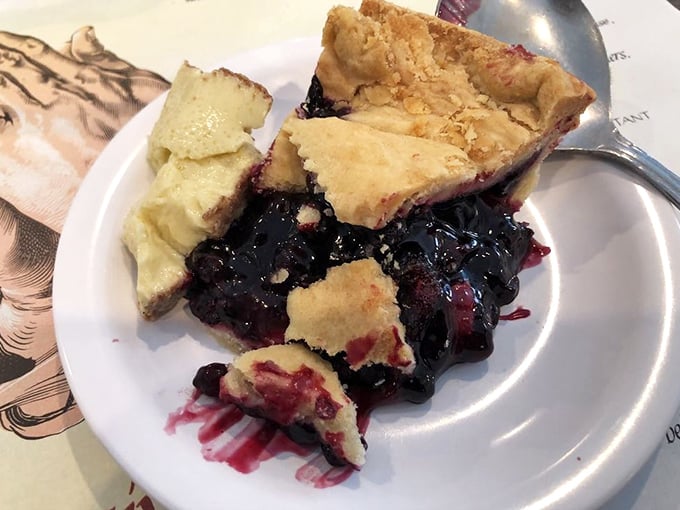 Blueberry pie that makes you question every other dessert decision you've ever made—flaky crust, bursting berries, and just the right balance of sweet and tart.