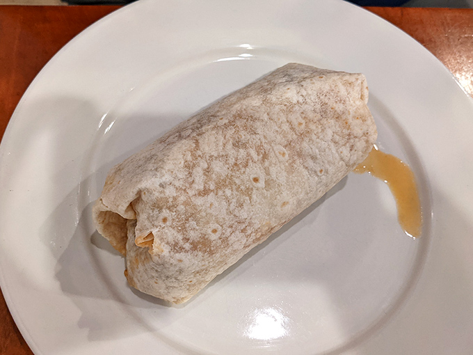 The breakfast burrito—where morning ingredients find their higher purpose wrapped in a tortilla. Simple, portable, and utterly satisfying.