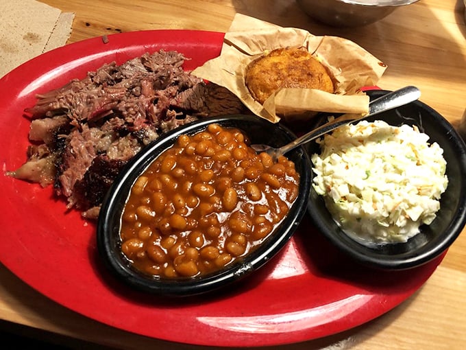 Brisket that's been smoking longer than some folks have been married, paired with those beans that could make a Texan tip their hat in respect.