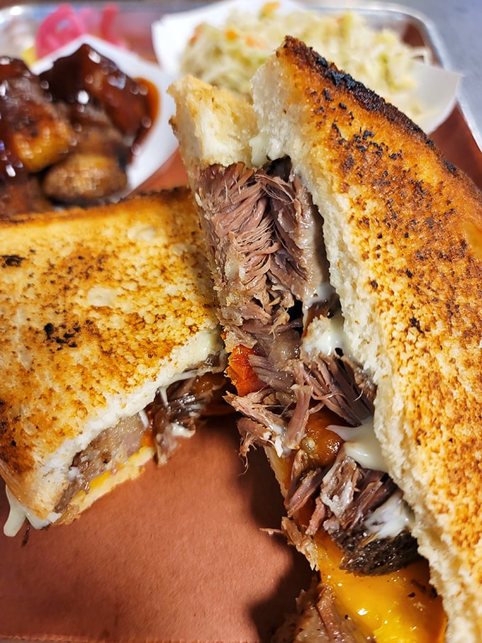 The brisket grilled cheese: where comfort food meets culinary genius. Like a warm hug from your favorite aunt, but tastier.