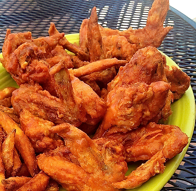 These wings aren't just fried—they're transformed. Crispy enough to make even the most stoic Midwesterner emit an audible "wow."