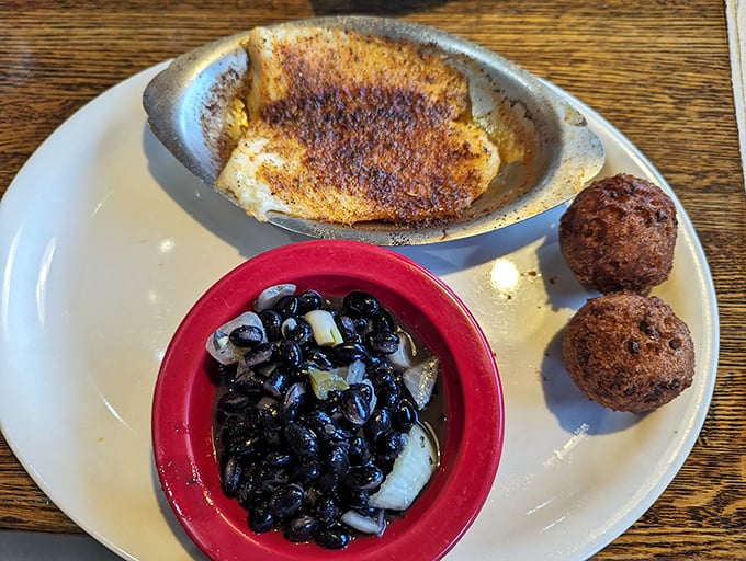 Broiled white fish with the perfect blackened seasoning—proof that sometimes the simplest preparation lets truly fresh seafood shine brightest.