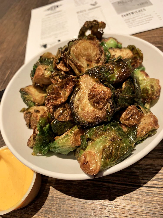 Brussels sprouts that could convert even the most dedicated vegetable skeptic. Charred edges create flavor neighborhoods you'll want to visit repeatedly.