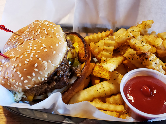 The burger that launched a thousand road trips. That perfect char isn't an accident—it's the result of a grill that's seen more action than a Hollywood stuntman.