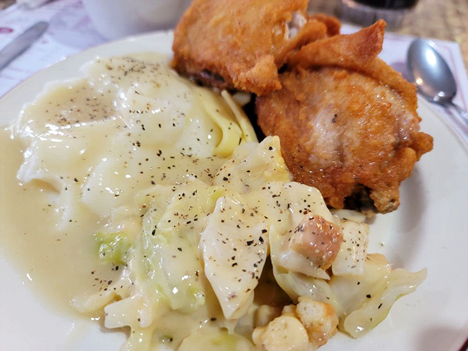 These noodles and chicken aren't just food – they're edible nostalgia, swimming in gravy that could solve international conflicts.