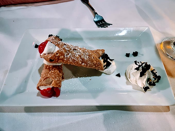 Cannoli that would make any Sicilian grandmother nod in approval – crisp shells filled with sweet cream and finished with a touch of elegance.