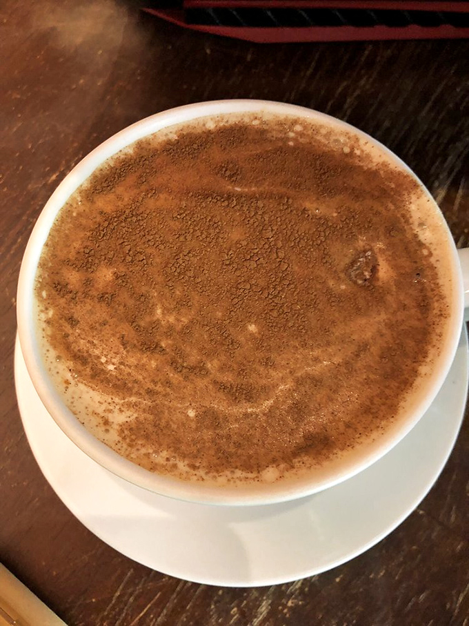 The legendary chai latte in all its cinnamon-dusted glory – worth crossing county lines for on a Tuesday morning.