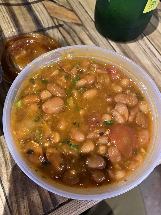 These charro beans pack more flavor than a telenovela plot twist, swimming in smoky, spicy perfection.