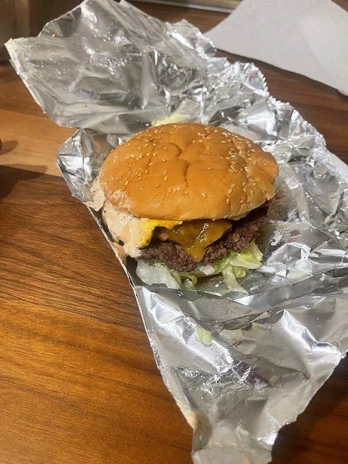 Not all heroes wear capes—some come wrapped in foil with melted cheese cascading down a perfectly grilled patty.