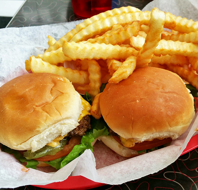Two sliders that didn't get the memo about being "small plates." These burgers mean business, with fries standing at attention.