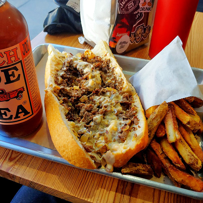 A proper Philly sandwich demands a proper beverage companion. This cheesesteak and those fries are having the best first date ever.