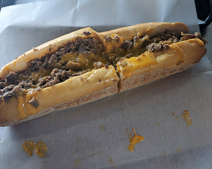Behold the Whiz cheesesteak in all its molten glory – where thinly sliced beef and that signature orange cheese create a sandwich worth crossing state lines for.