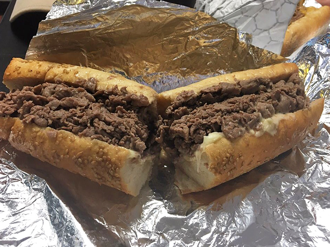 Behold, the reason people cross state lines. Thinly sliced ribeye piled high on a seeded roll – Philadelphia's most famous culinary export in its natural habitat.