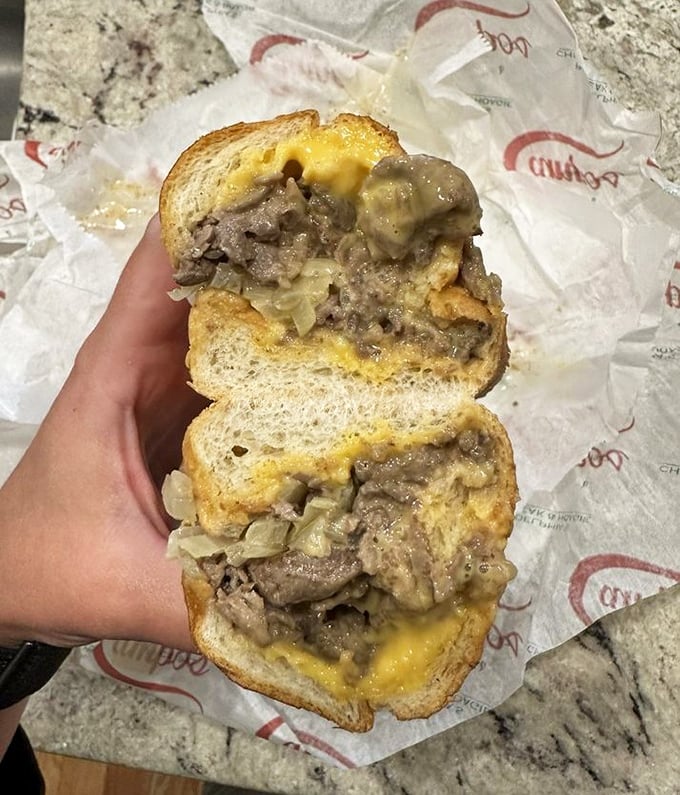 The classic "Whiz Wit" in all its golden glory – a sandwich so perfectly Philadelphian it should come with its own Liberty Bell.