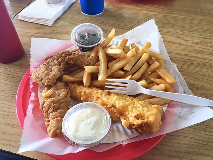 The ultimate combo—crispy chicken and fish with chips that could make a Brit homesick. This plate doesn't need a passport to transport you across the Atlantic.