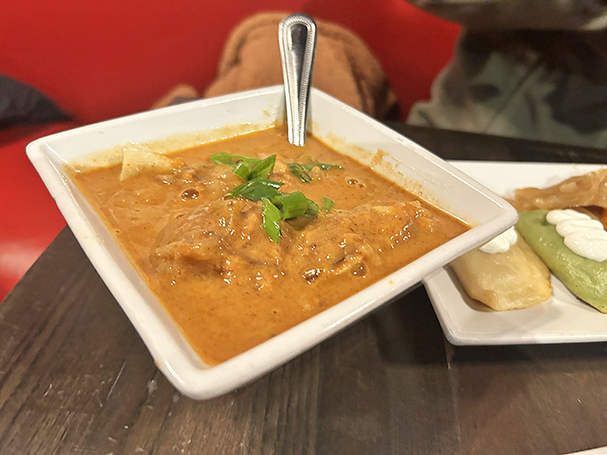 This isn't just soup—it's a hug in a bowl. Rich, paprika-infused broth with tender chicken alongside colorful pierogies.