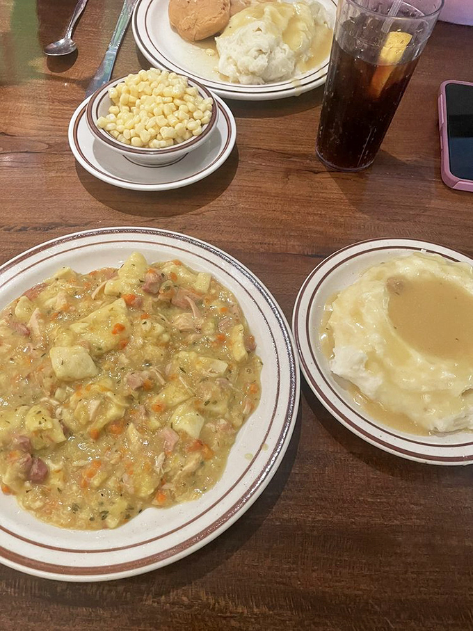 The chicken pot pie here isn't just comfort food—it's a masterclass in homestyle cooking. Those chunks of chicken and vegetables tell you someone's grandmother is definitely involved.