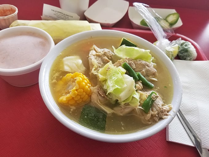 Not just burritos! Their chicken soup could make your grandmother question her recipe—chunks of corn, cabbage, and tender chicken in golden broth.