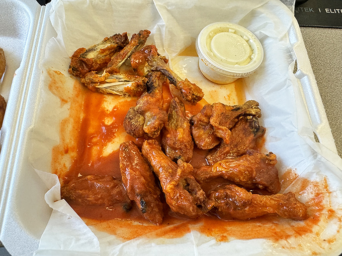 These wings aren't just tossed in sauce; they're having a full-blown flavor party and everyone's invited.