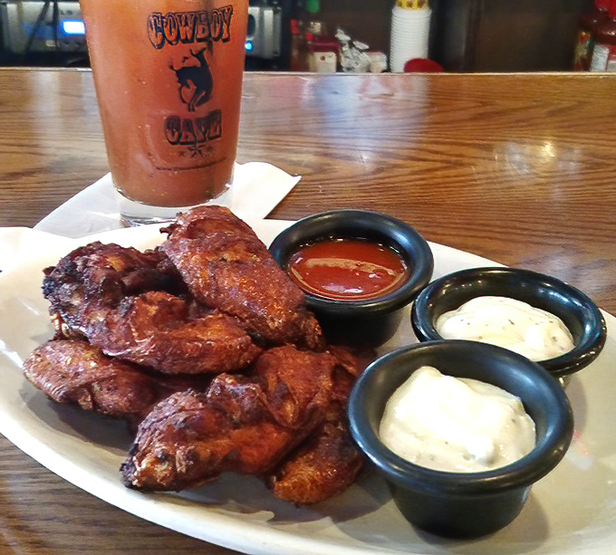Wings that could make Buffalo jealous, served with a trio of dipping sauces. That Bloody Mary in the background isn't just for show.