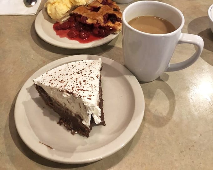 A slice of chocolate cream pie and coffee—the kind of afternoon delight that makes you forget you had other plans for the day.