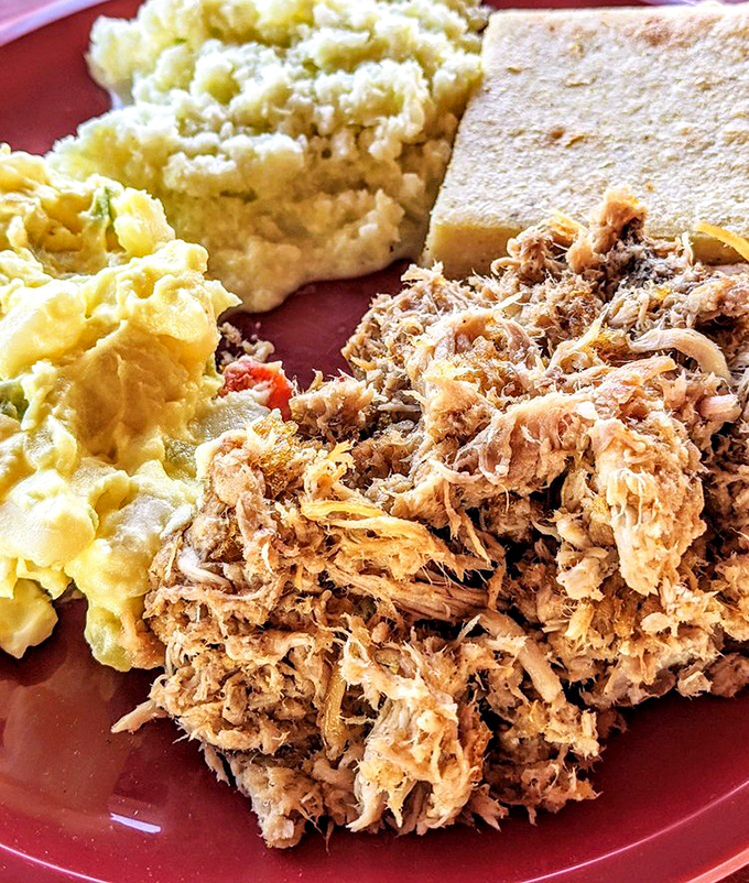 This is what barbecue dreams are made of—perfectly chopped pork with that magical mix of tender meat and crunchy bark that haunts your memories forever.