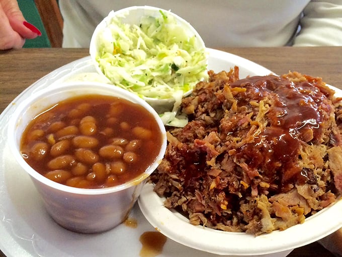 Chopped pork with a side of slaw and beans – the holy trinity of Southern barbecue that makes you wonder why you'd ever eat anything else.