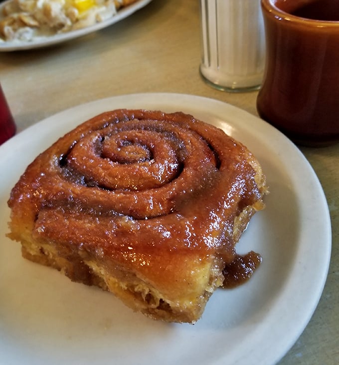 Not all heroes wear capes—some come in spiral form, dripping with cinnamon-sugar glaze that should be classified as a controlled substance.