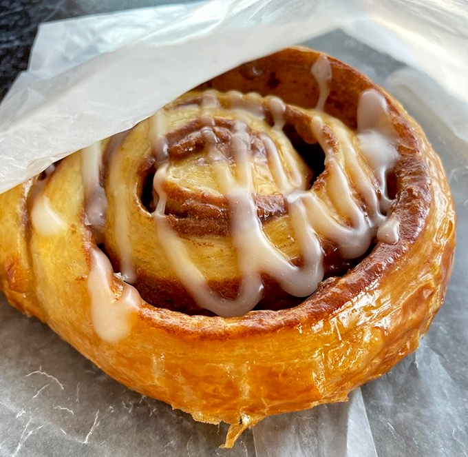 This cinnamon roll could double as a life preserver – sweet, spiraled, and absolutely necessary.