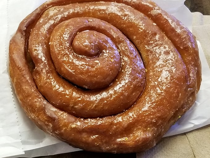 This cinnamon roll isn't just a pastry, it's an architectural marvel of spiraling perfection that demands to be admired before devoured.