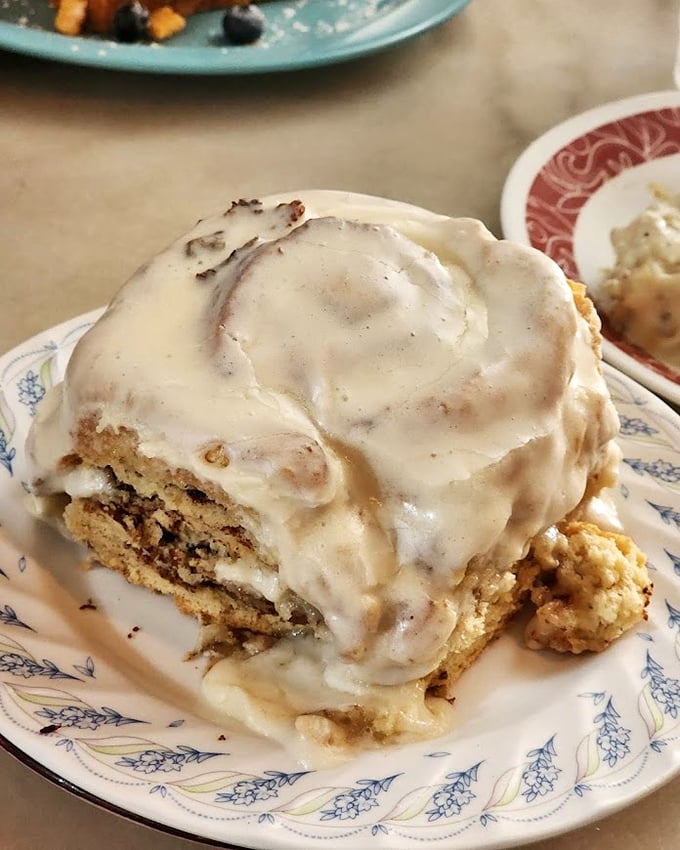 Cinnamon rolls so decadent they should require a permission slip. This isn't breakfast—it's dessert with diplomatic immunity.