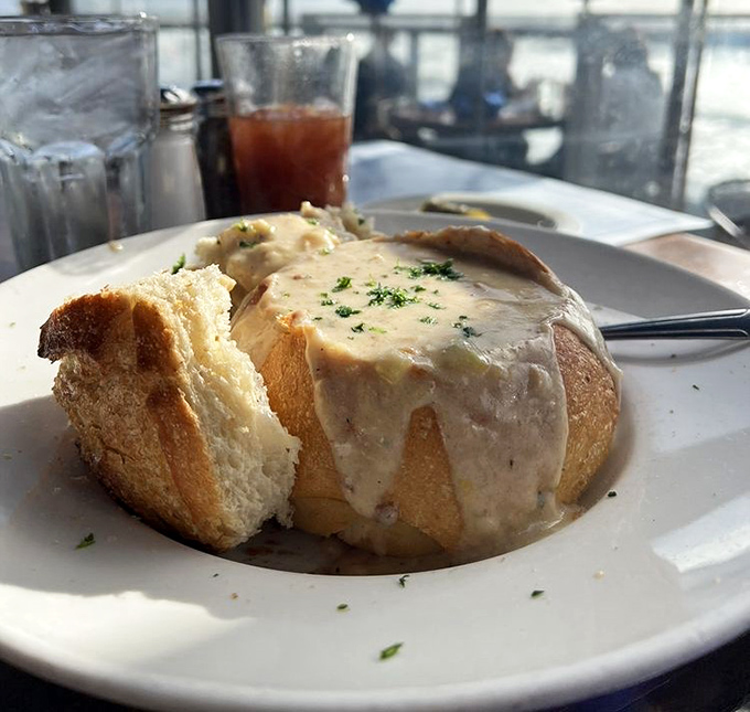 Clam chowder served in a sourdough bread bowl—a California coast tradition that answers the eternal question: "Why can't all dishes be edible?"
