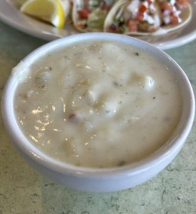This clam chowder isn't just soup—it's a creamy ocean hug in a bowl, with tender clams playing hide-and-seek among perfectly cooked potatoes.