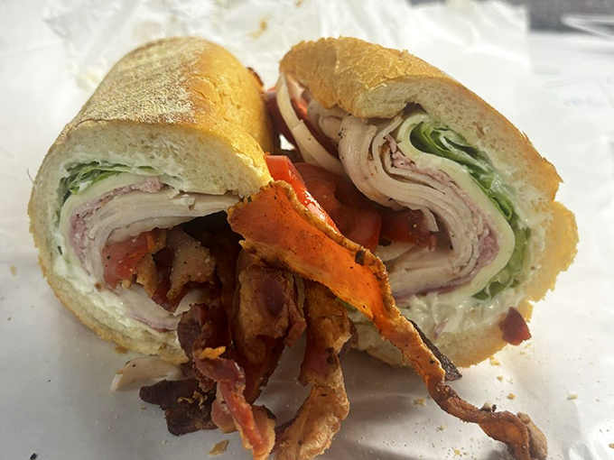 The legendary Club Sub in all its cross-sectional glory – a masterclass in architecture where each ingredient plays its essential role in sandwich harmony.