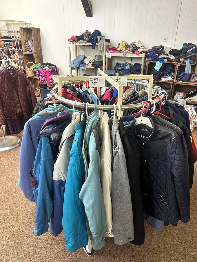 The coat section resembles a timeline of fashion history. That blue windbreaker might have witnessed Woodstock—or at least a great '90s tailgate.