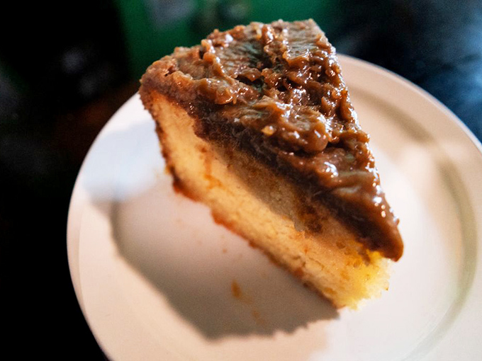 Rum cake that doesn't just have rum in it—it practically has a passport stamp from Jamaica. Dense, moist, and potent enough to make you consider Uber.