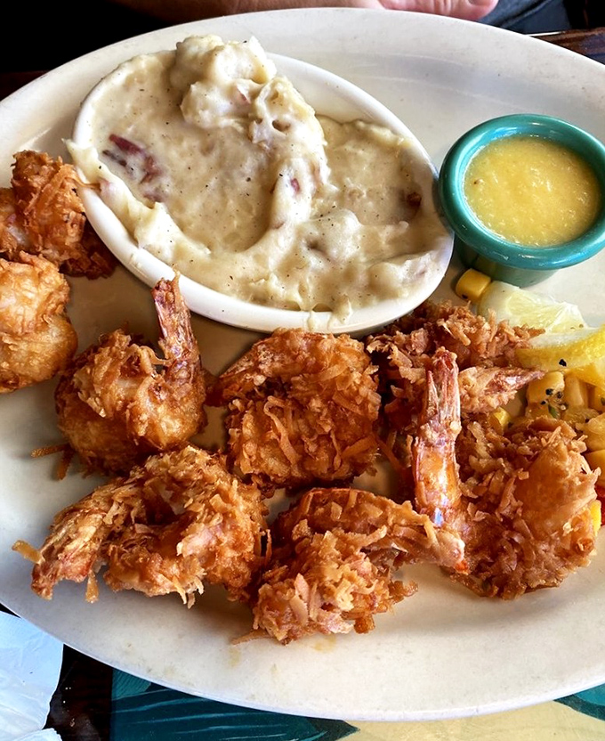 Golden coconut shrimp that could make even a mermaid consider switching to land-based dining permanently.