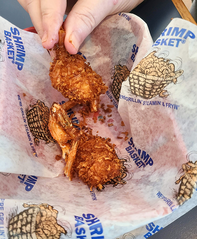 These coconut shrimp aren't just fried, they're transformed – wearing a golden armor of crispy coconut that shatters with each blissful bite.