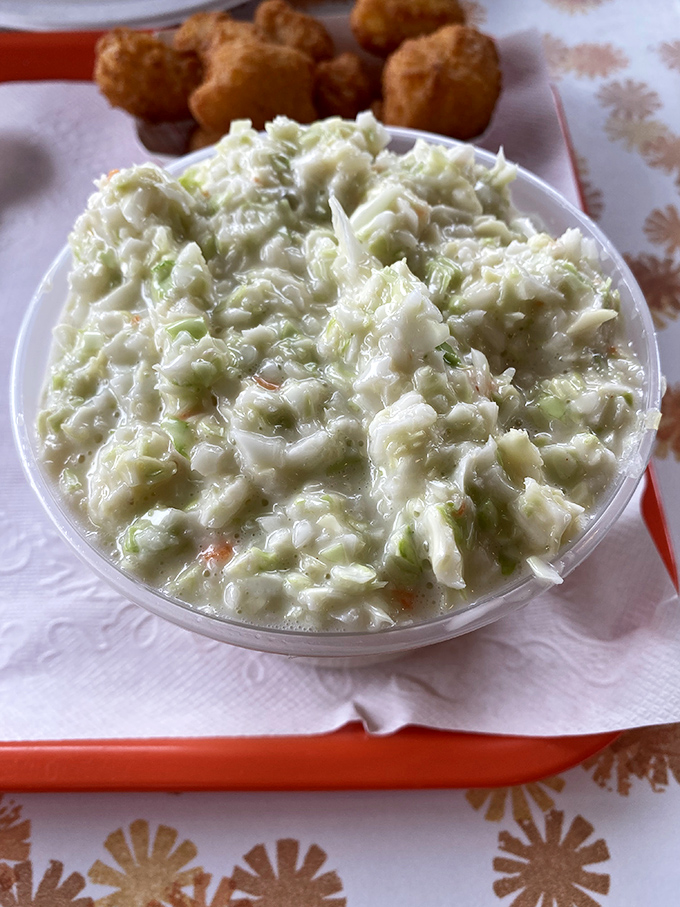 Coleslaw that actually deserves a place at the table. Crisp, creamy, and the perfect counterpoint to that broasted chicken—like the reliable sidekick in your favorite buddy movie.