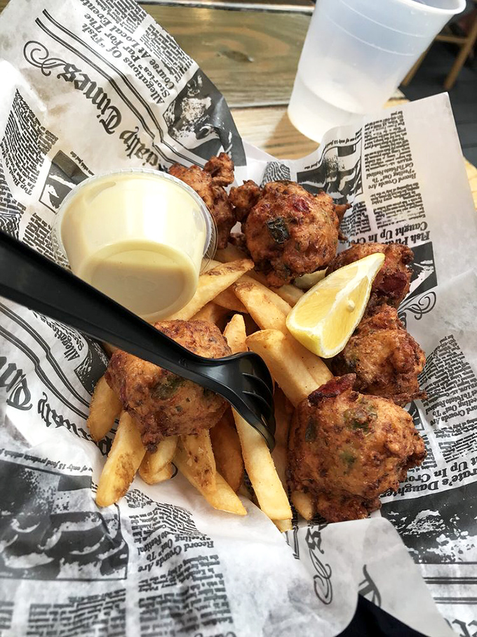 These conch fritters aren't just appetizers—they're edible postcards from the Caribbean, each crispy orb telling delicious tales of island flavors.
