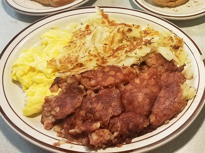 Corned beef hash with eggs and hash browns – the holy trinity of breakfast that's converted more morning skeptics than Sunday sermons.