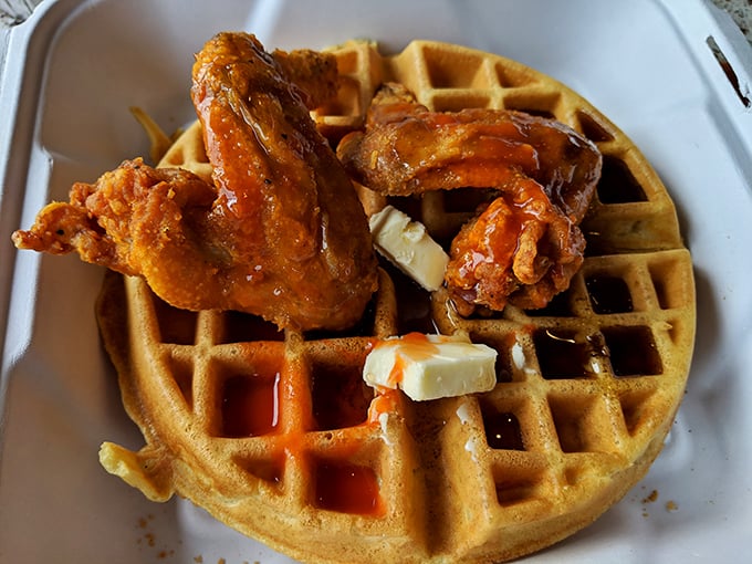 The classic combo that launched a thousand road trips. That waffle isn't just a sidekick—it's an equal partner in this culinary love story.