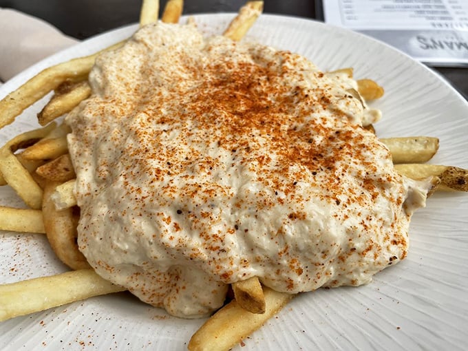 Crabby Fries: where French fries decided to dress up for a fancy night out, donning a creamy crab dip tuxedo.
