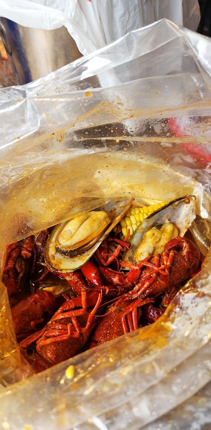 Peek inside this clear bag of wonders and you'll find what pirates really treasure—not gold, but perfectly seasoned crawfish and mussels.