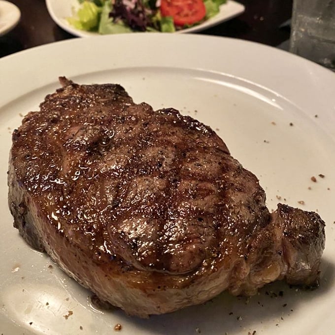 This Delmonico steak isn't just dinner; it's a masterclass in meat preparation with a sear that would make professional chefs weep with joy.