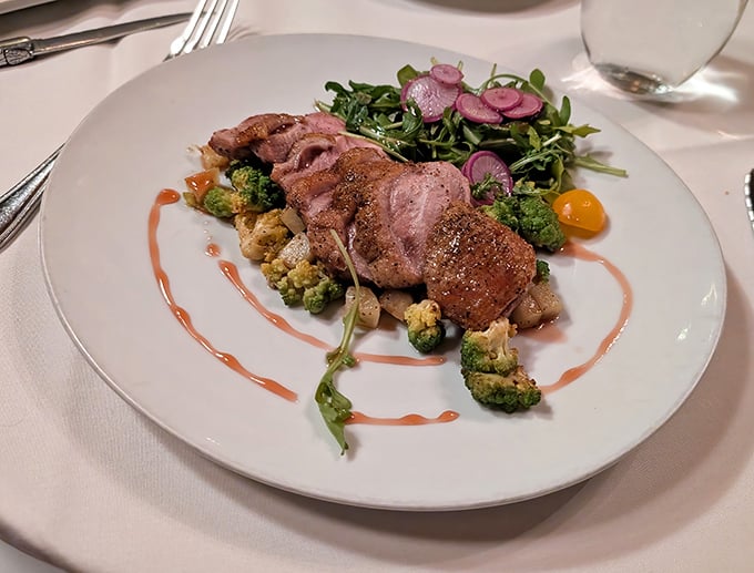 Duck breast that strikes the perfect balance between rustic and refined, like a lumberjack who secretly reads poetry.