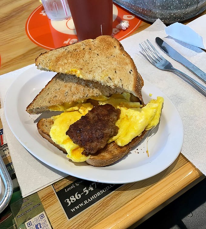 Egg and Sausage Sandwich: Breakfast engineering at its finest—the humble egg sandwich elevated to an art form where the yolk creates nature's perfect sauce.